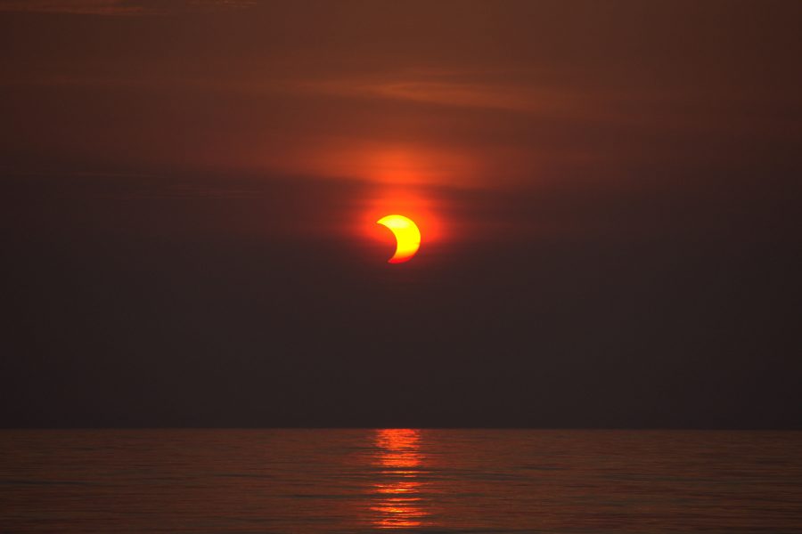 Eclipse at Sunrise - Sky & Telescope - Sky & Telescope
