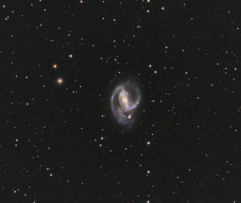 NGC 1097 - Barred spiral galaxy - Sky & Telescope - Sky & Telescope